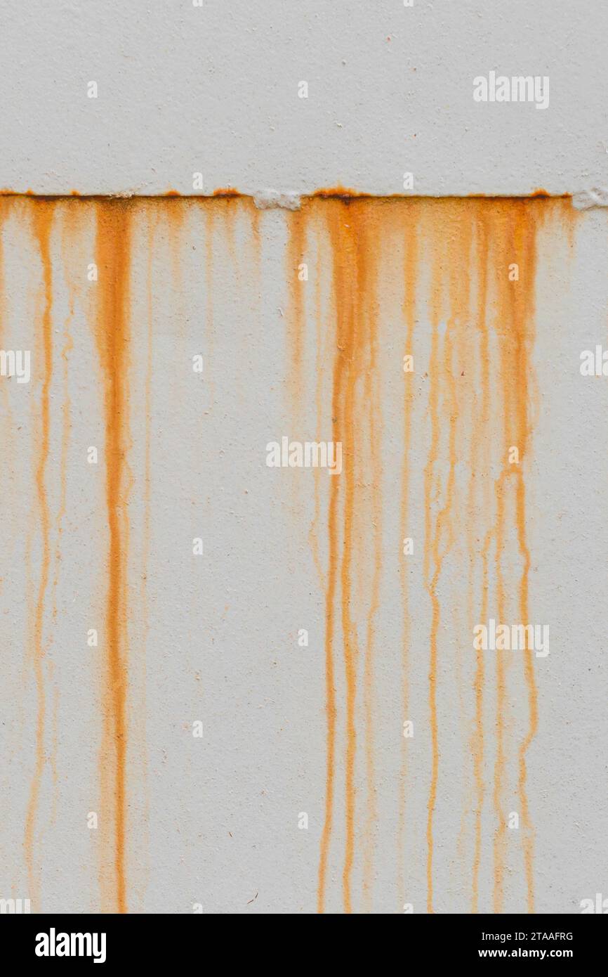 Rusty orange streaks rust on metal fence surface view old texture ...