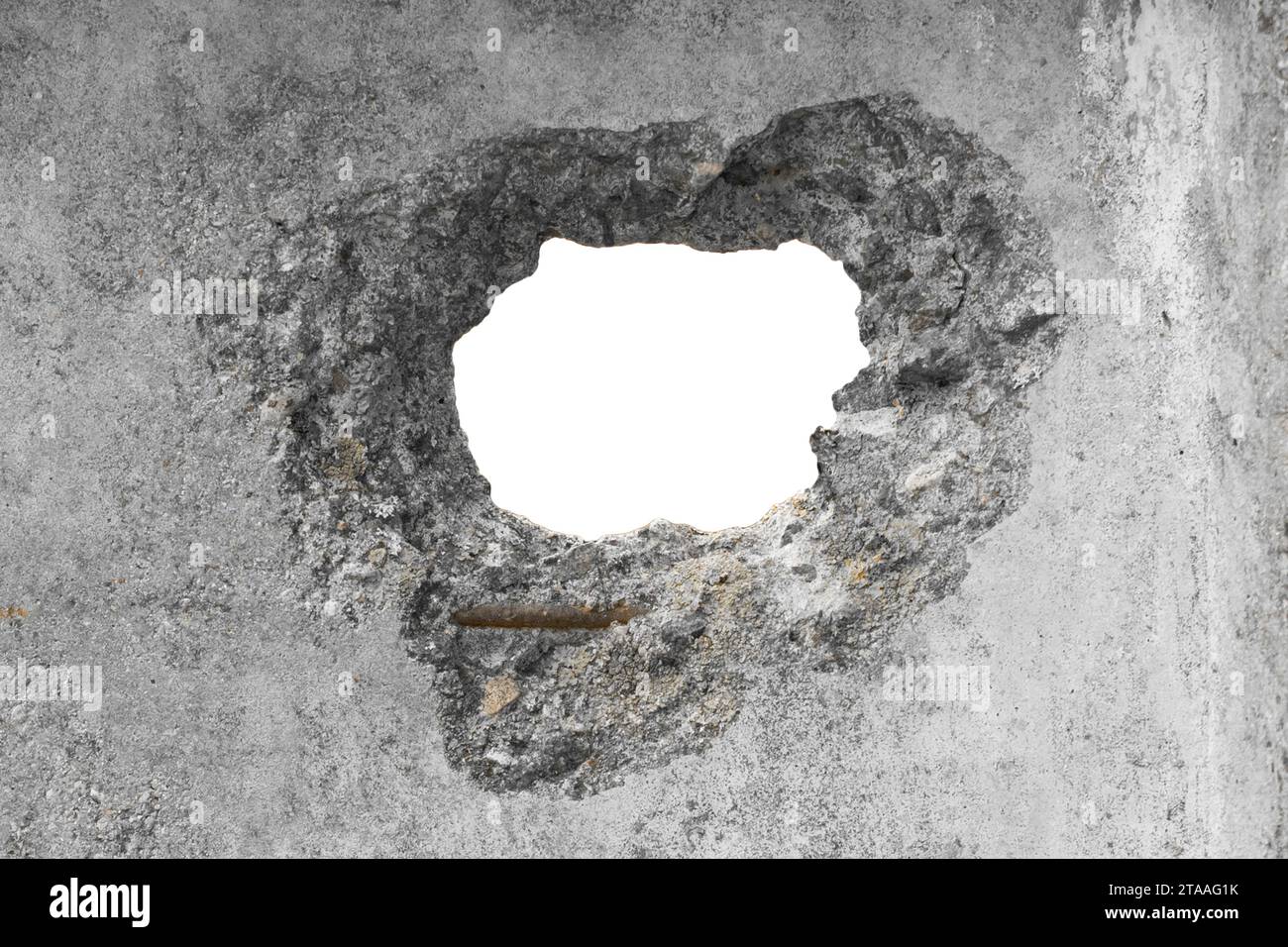 Hole circle round in concrete fence wall, isolated white, close-up ...