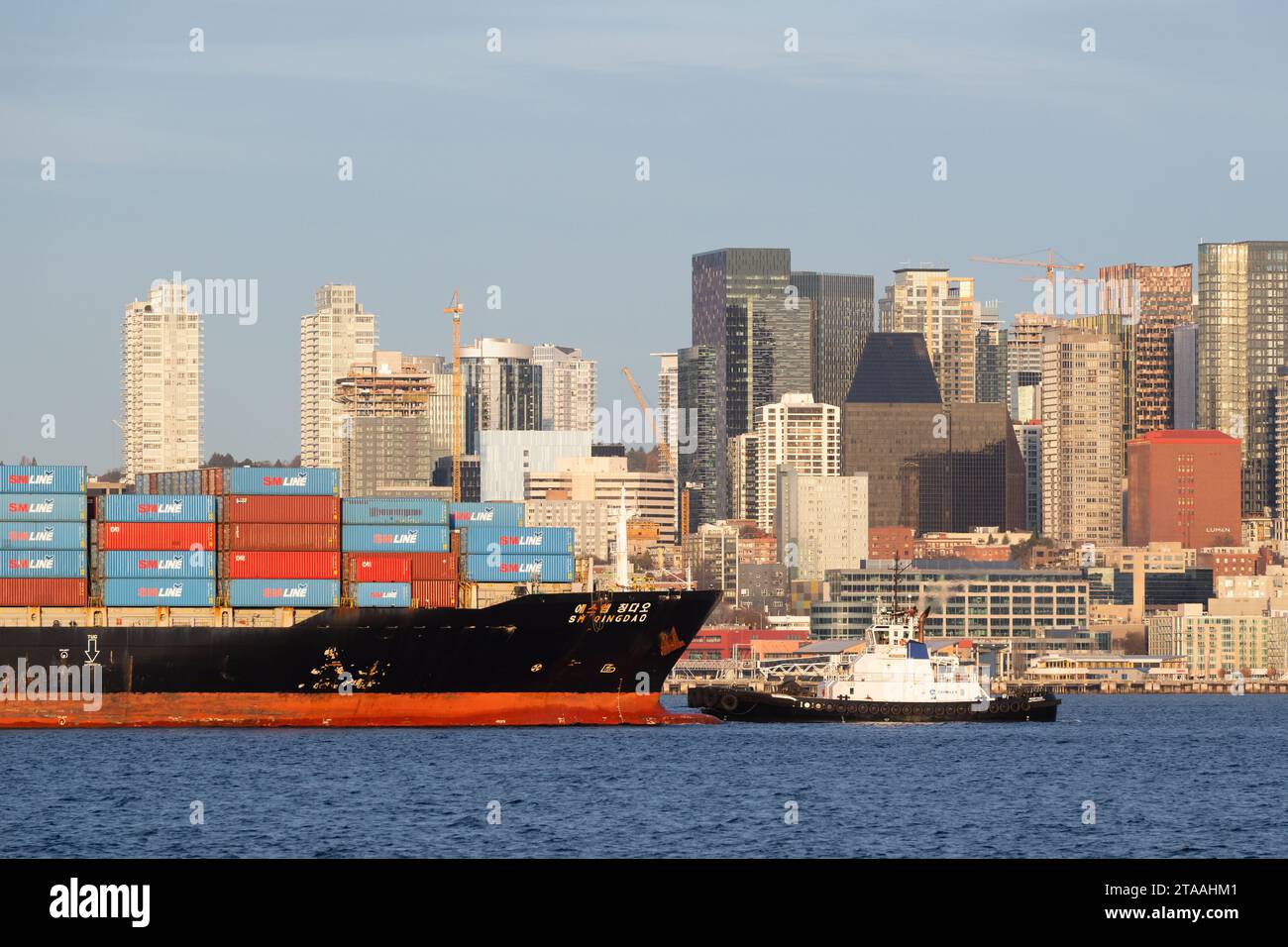 Seattle - November 20, 2023; SM Line container ship Qingdao assisted by ...
