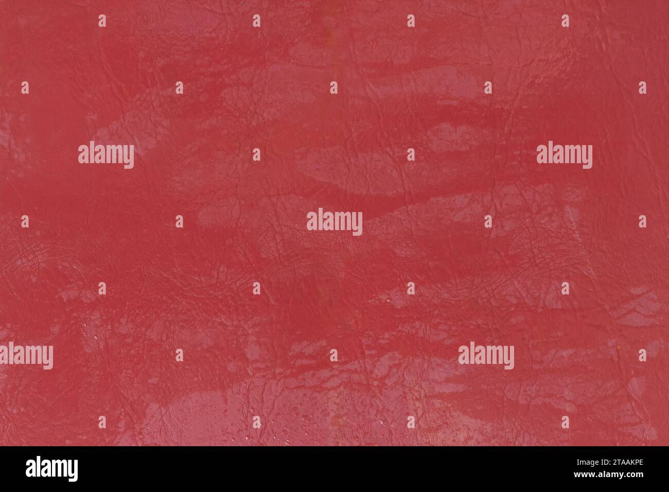 Wet water surface of red leather streaks background texture backdrop ...