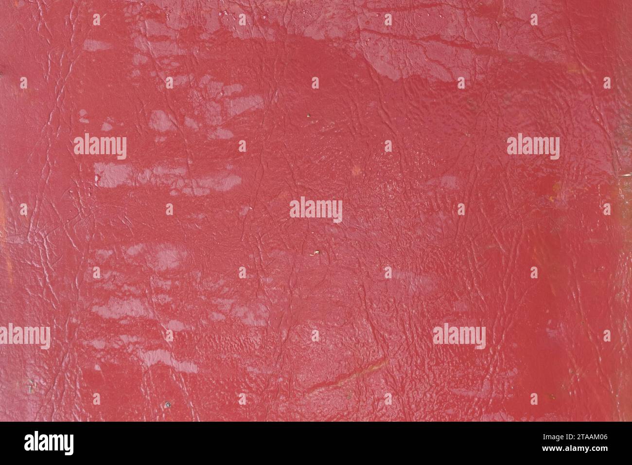 Wet water surface of red leather streaks background texture spots Stock ...