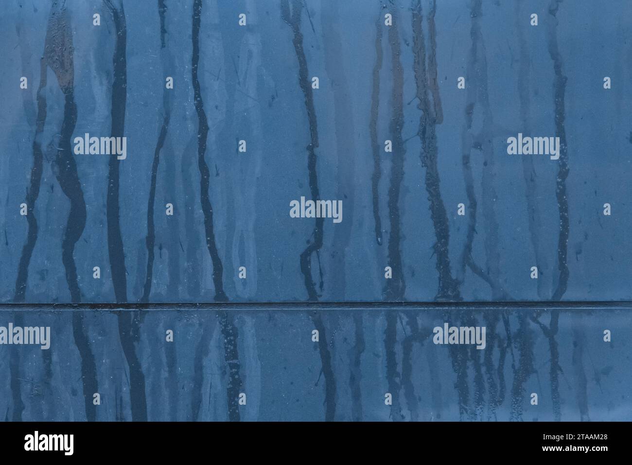 Blue streaks paint spilled surface ceramic tiles wall dirty texture ...