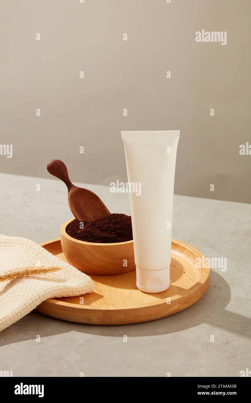 Front view of plastic tube unlabeled on round wooden dishes with coffee ...