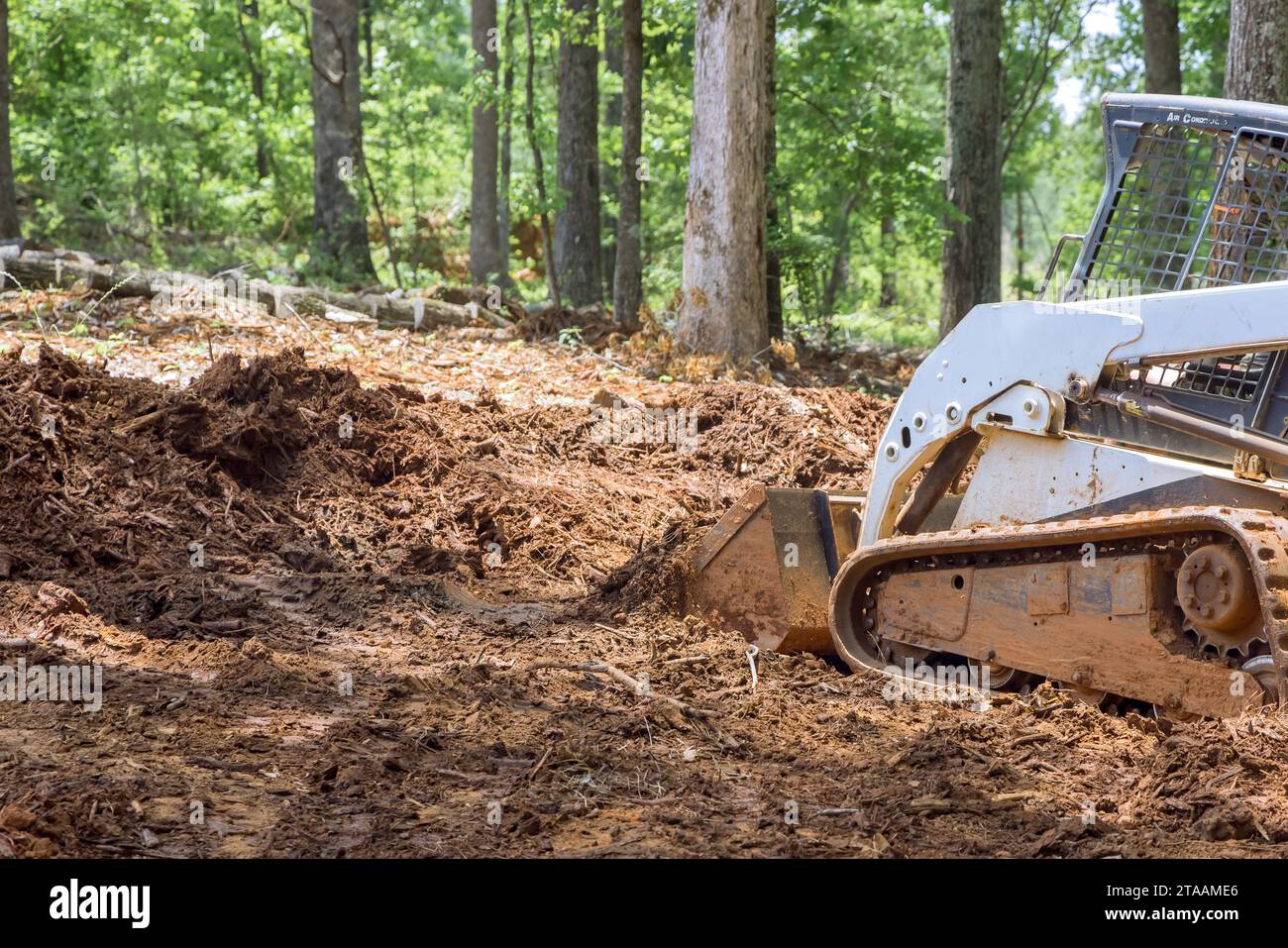 Working with earth, moving soil, improving the landscaping of territory ...