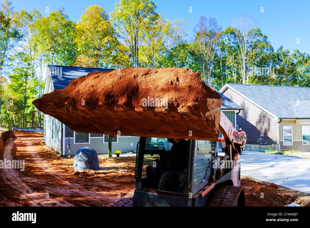 Mini bulldozer soil moving used for landscaping, land improvement Stock ...