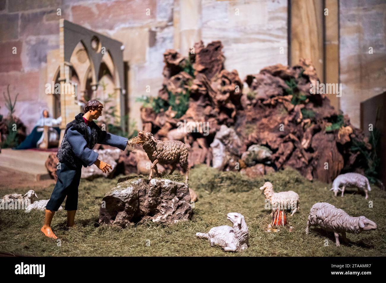 Bamberg, Germany. 29th Nov, 2023. A nativity scene with a shepherd and sheep. The nativity scene ...
