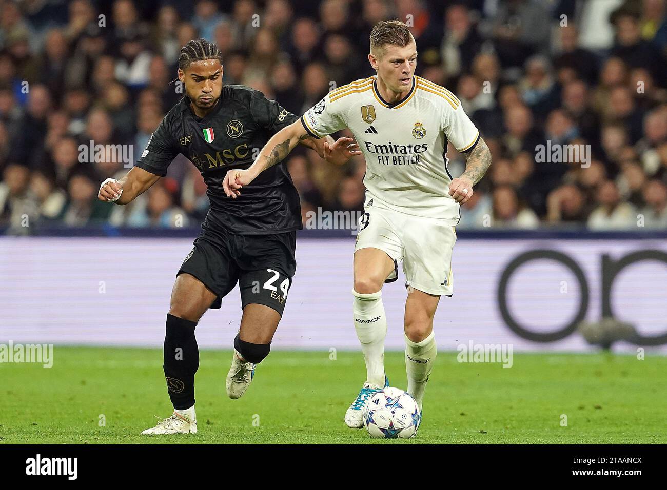 Madrid, Spain. 29th Nov, 2023. Real Madrid CF's Toni Kroos (r) and SSC ...