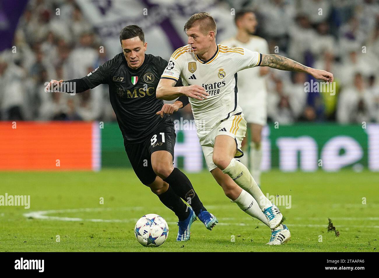 Madrid, Spain. 29th Nov, 2023. Real Madrid CF's Toni Kroos (r) and SSC ...