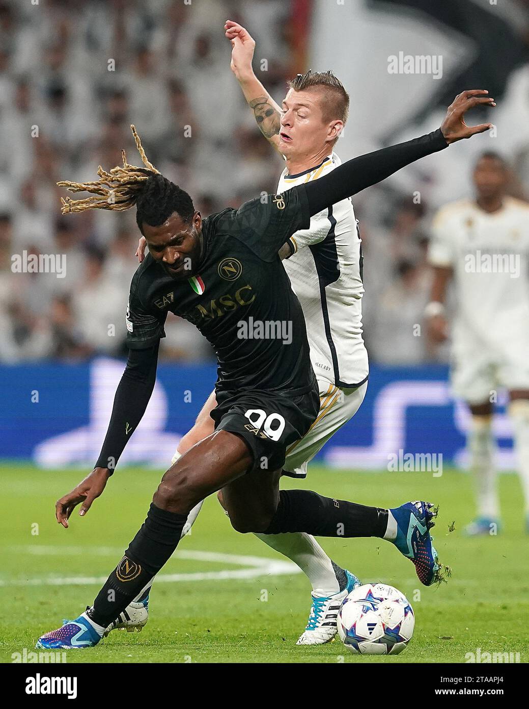 Madrid, Spain. 29th Nov, 2023. Real Madrid CF's Toni Kroos (r) and SSC ...