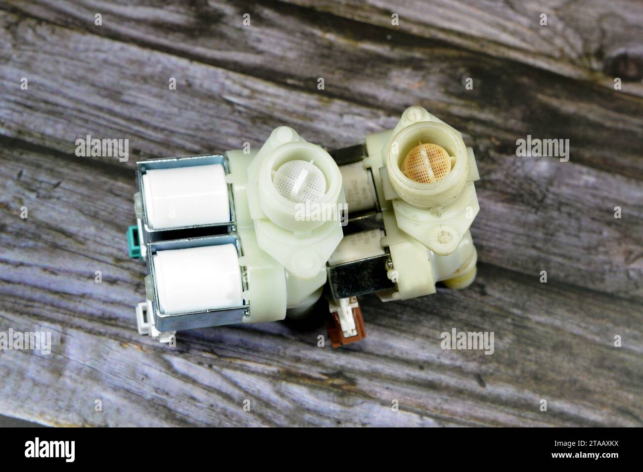 A broken and a new inlet water valves of automatic electric washing ...