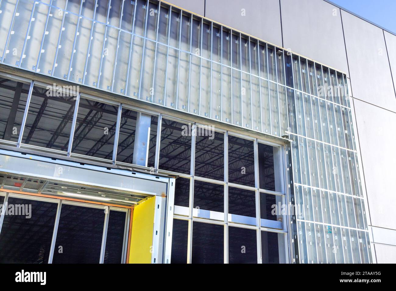 Steel framework for commercial building is being erected during ...