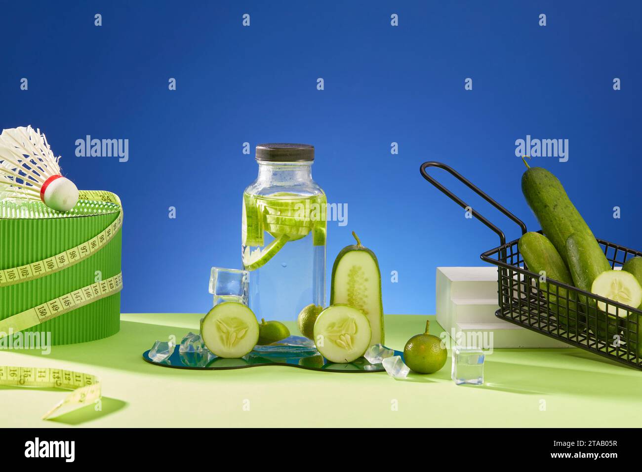 Cucumber detox water filled inside a bottle displayed with slices of ...
