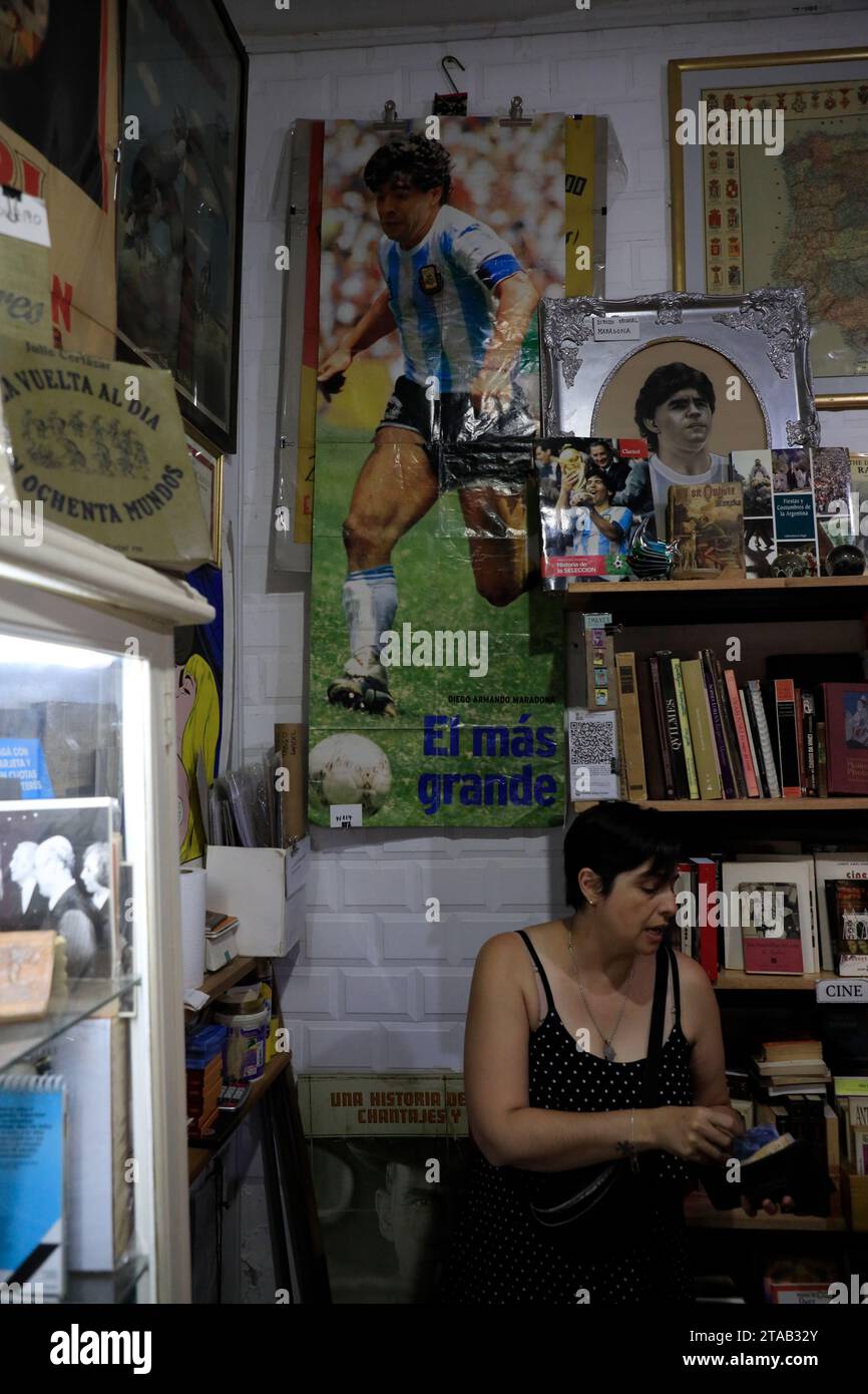 A secondhand book store with antique maps and Diego Maradona posters ...