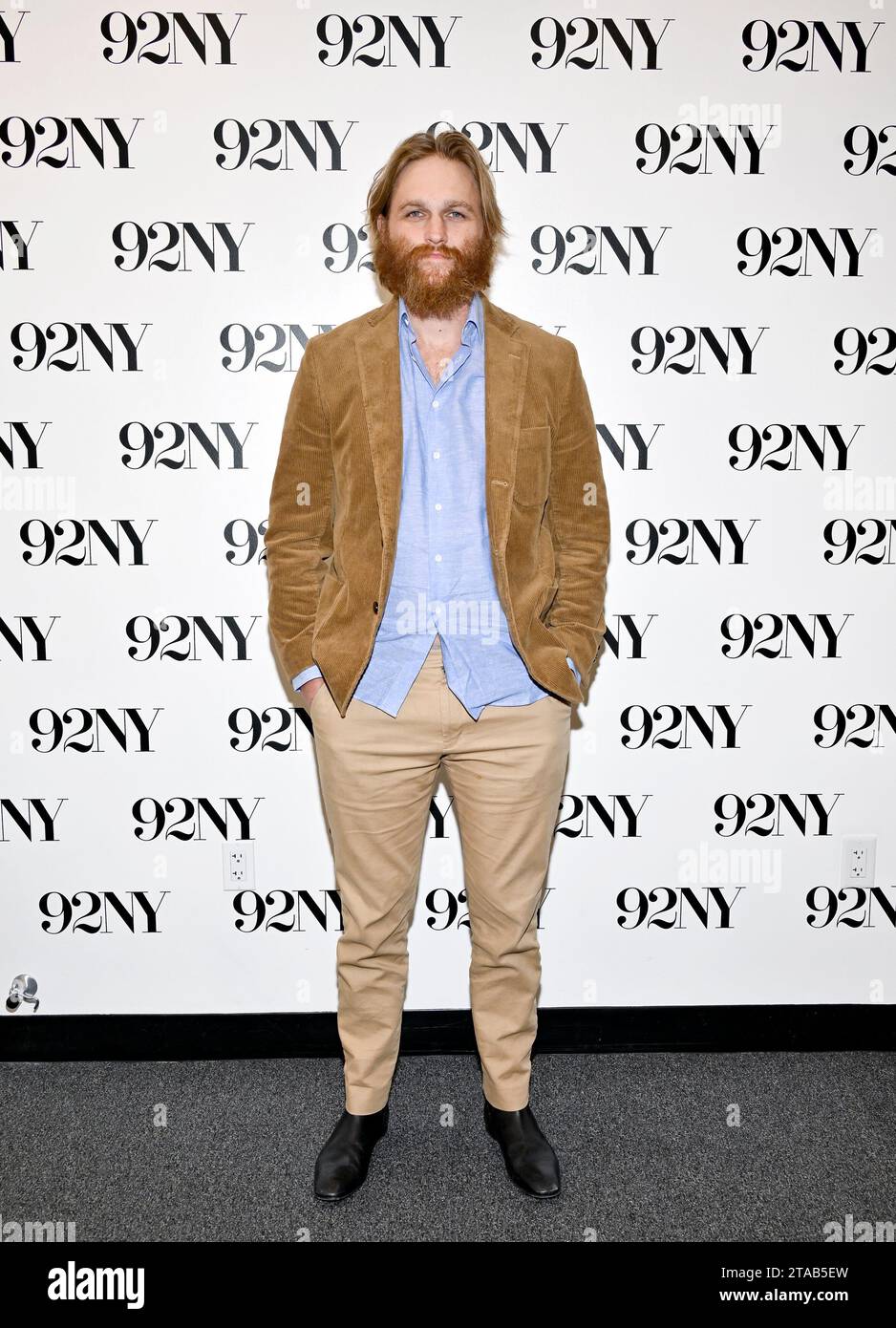 Wyatt Russell poses backstage before discussing the AppleTV+ series ...