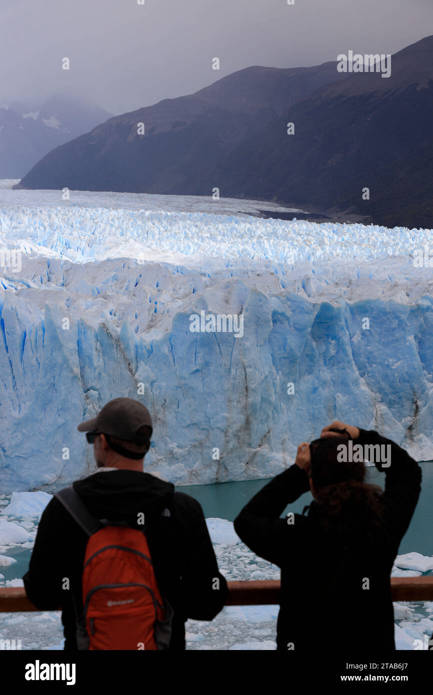 Visitors on the view deck in Los Glaciares National Park with Perito ...