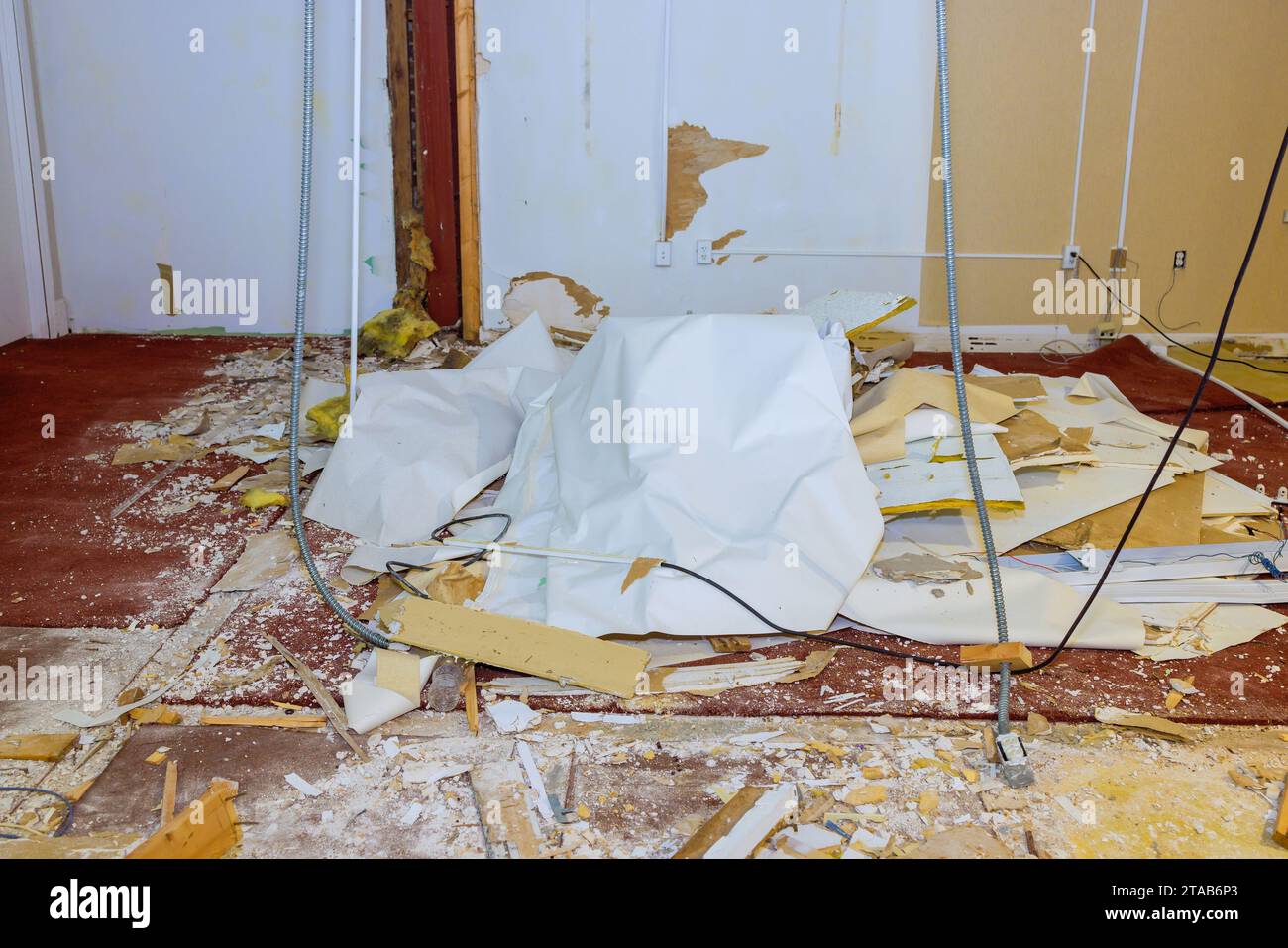 In course of reconstruction house, old damaged plasterboard drywall are ...