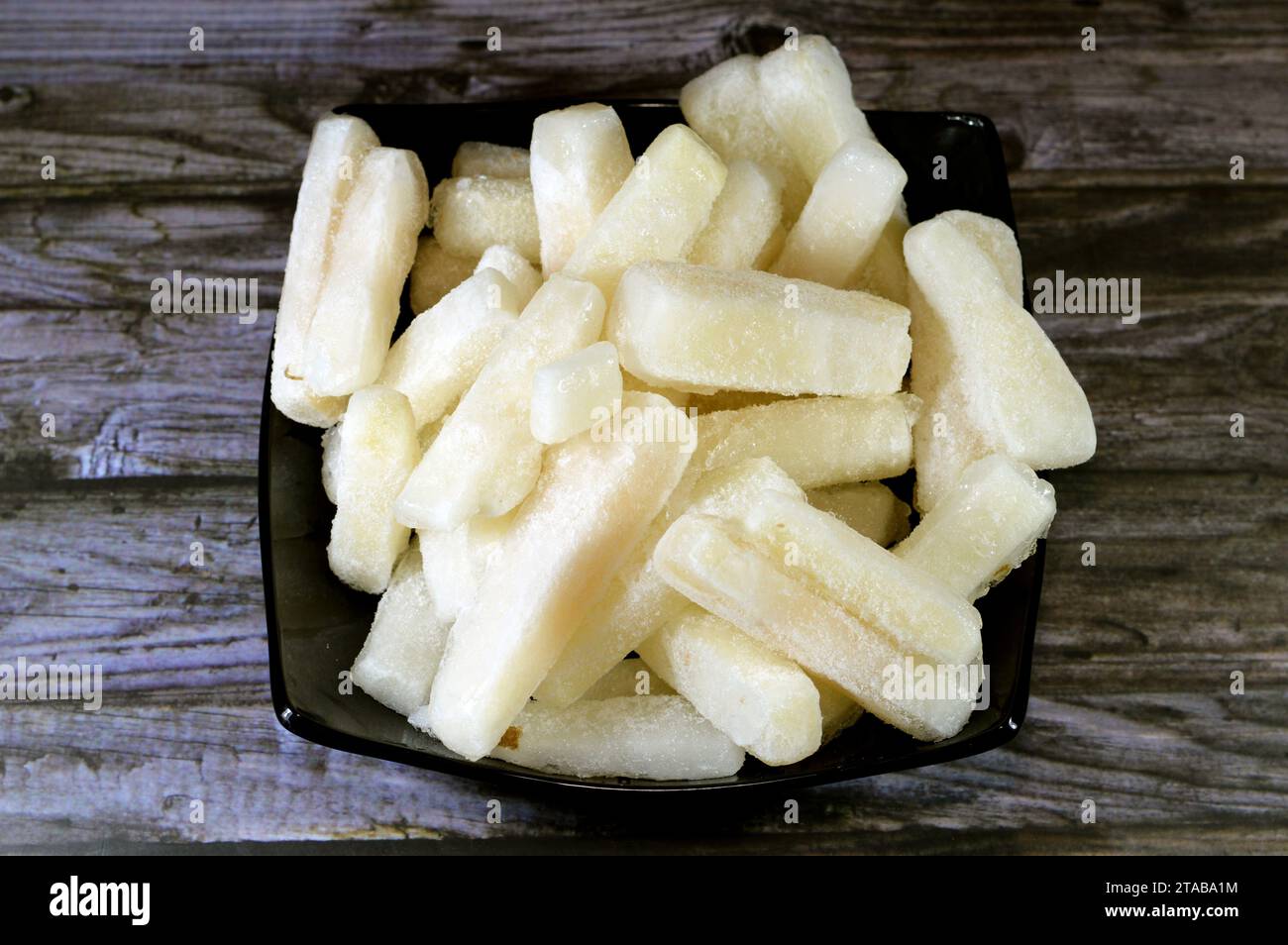 Fresh raw uncooked squid, a mollusc with an elongated soft body, large ...