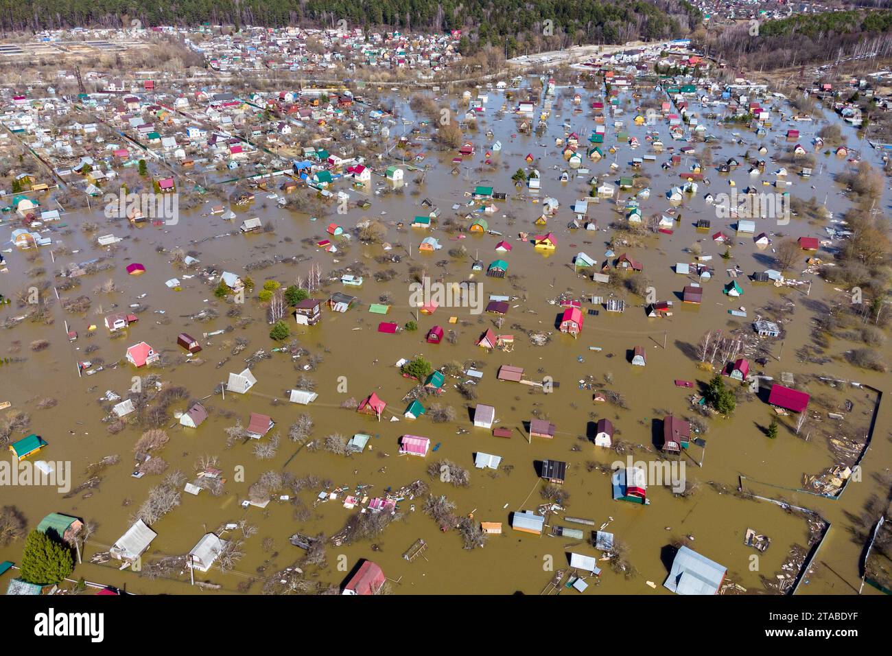 Private sector with small country houses flooded during the spring ...
