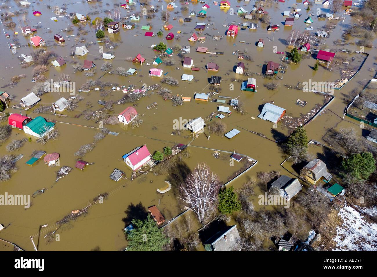 Private sector with small country houses flooded during the spring ...