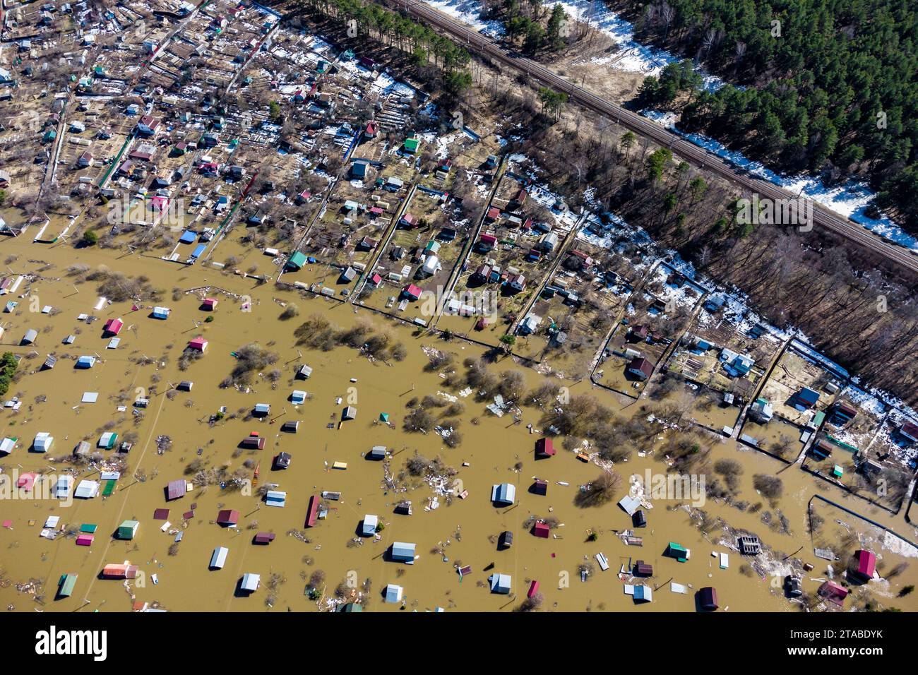 A large area with country houses flooded with water during the spring ...