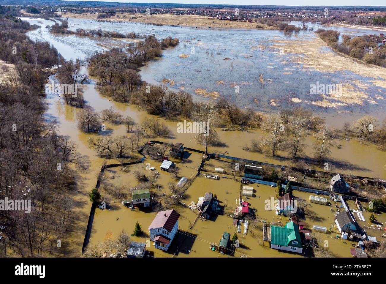 Flooded summer cottages during the spring flood of the river, aerial ...