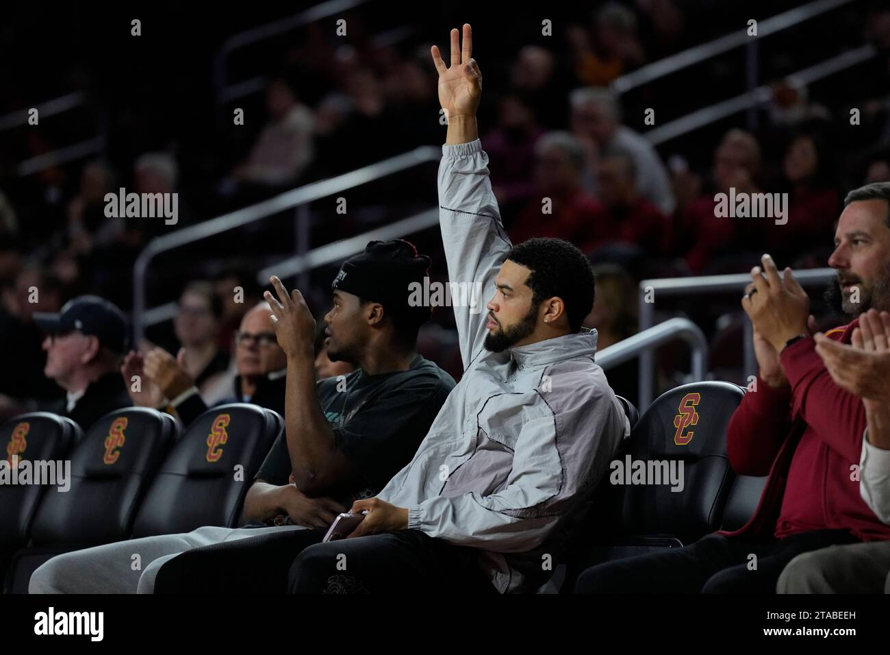 Southern California quarterback Caleb Williams celebrates from his seat ...