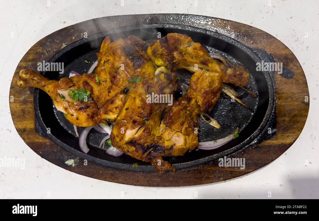 Chicken leg pieces barbecue roasted Stock Photo - Alamy