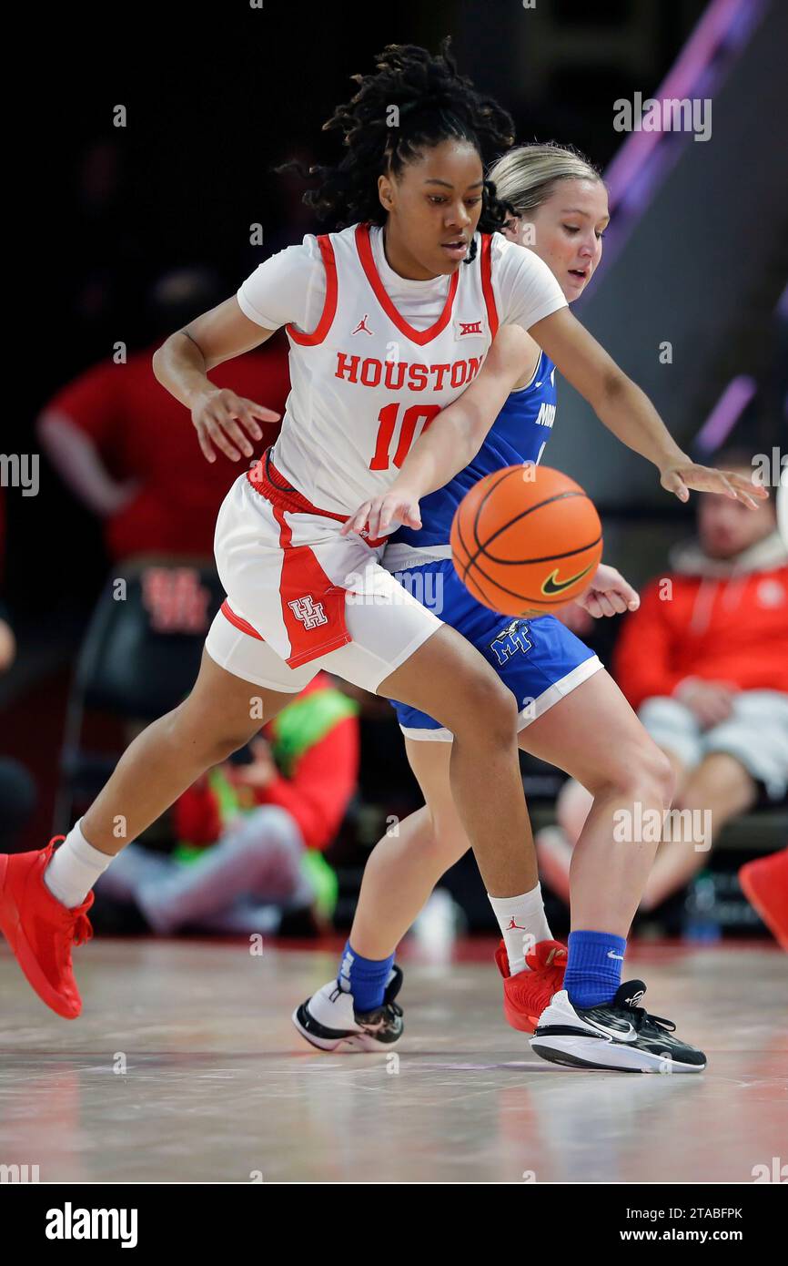 Houston guard Britney Onyeje (10) collides with Middle Tennessee guard Savannah Wheeler, right ...