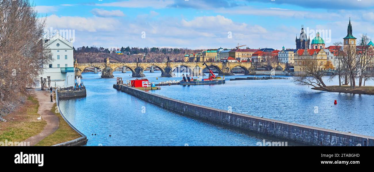 Panorama of Vltava River with Smichov river lock and Charles Bridge in ...