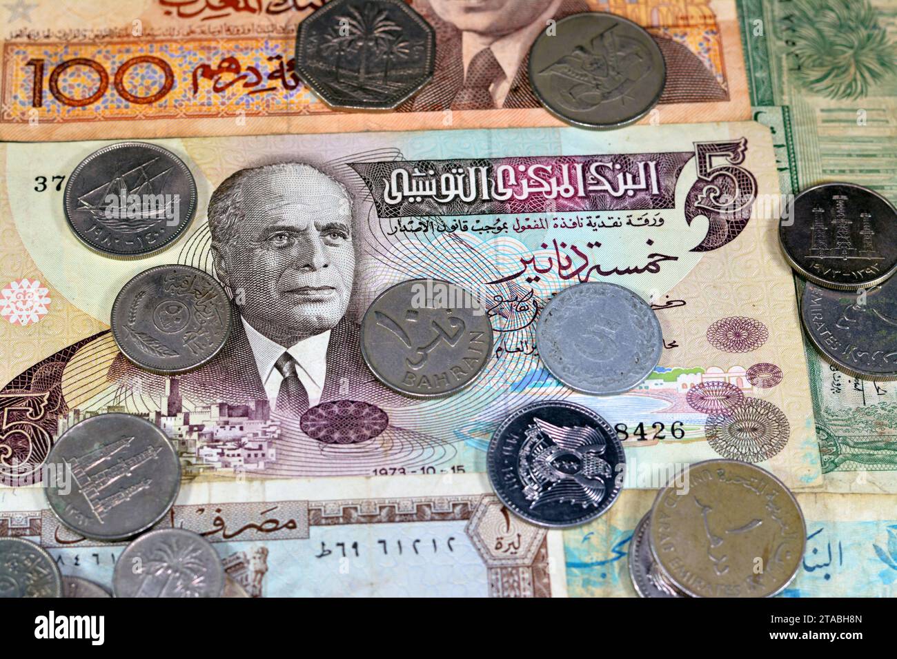 Collection of Old Arabian money banknotes and coins from different ...
