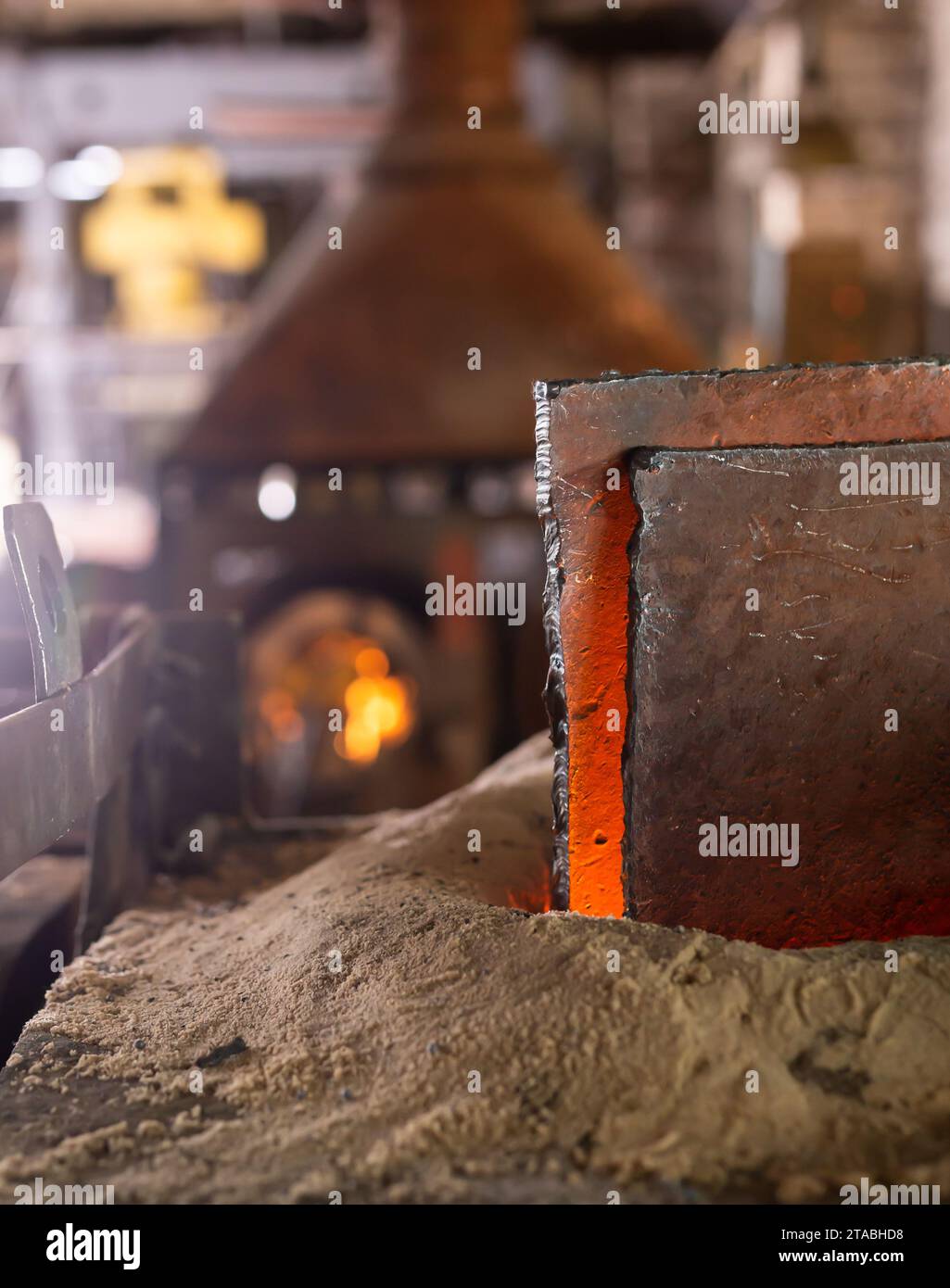 Foundry ferrous metal is melted in an induction furnace of ...