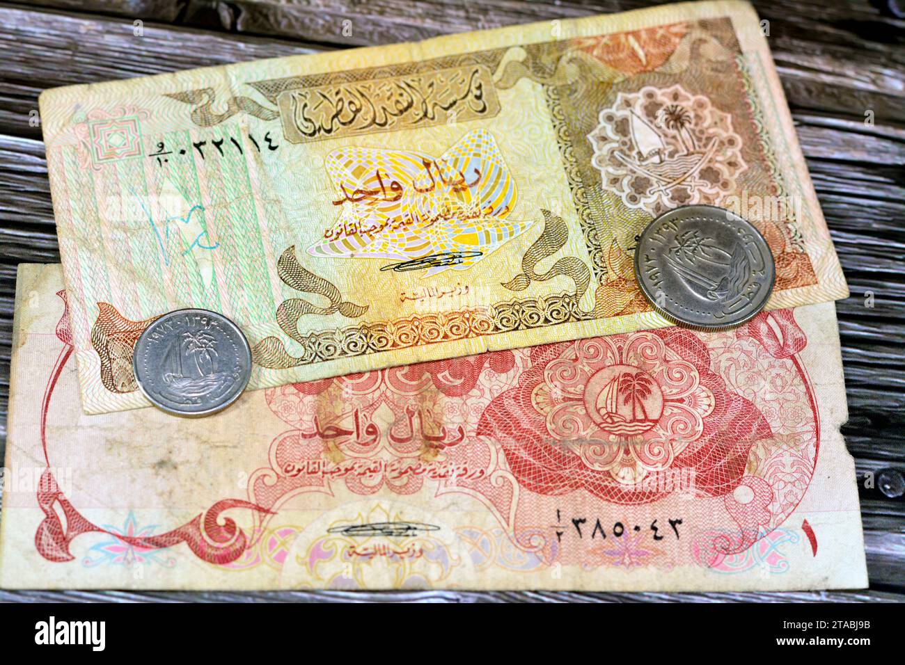 Qatari Money, money background of old coins and banknotes of riyals of ...
