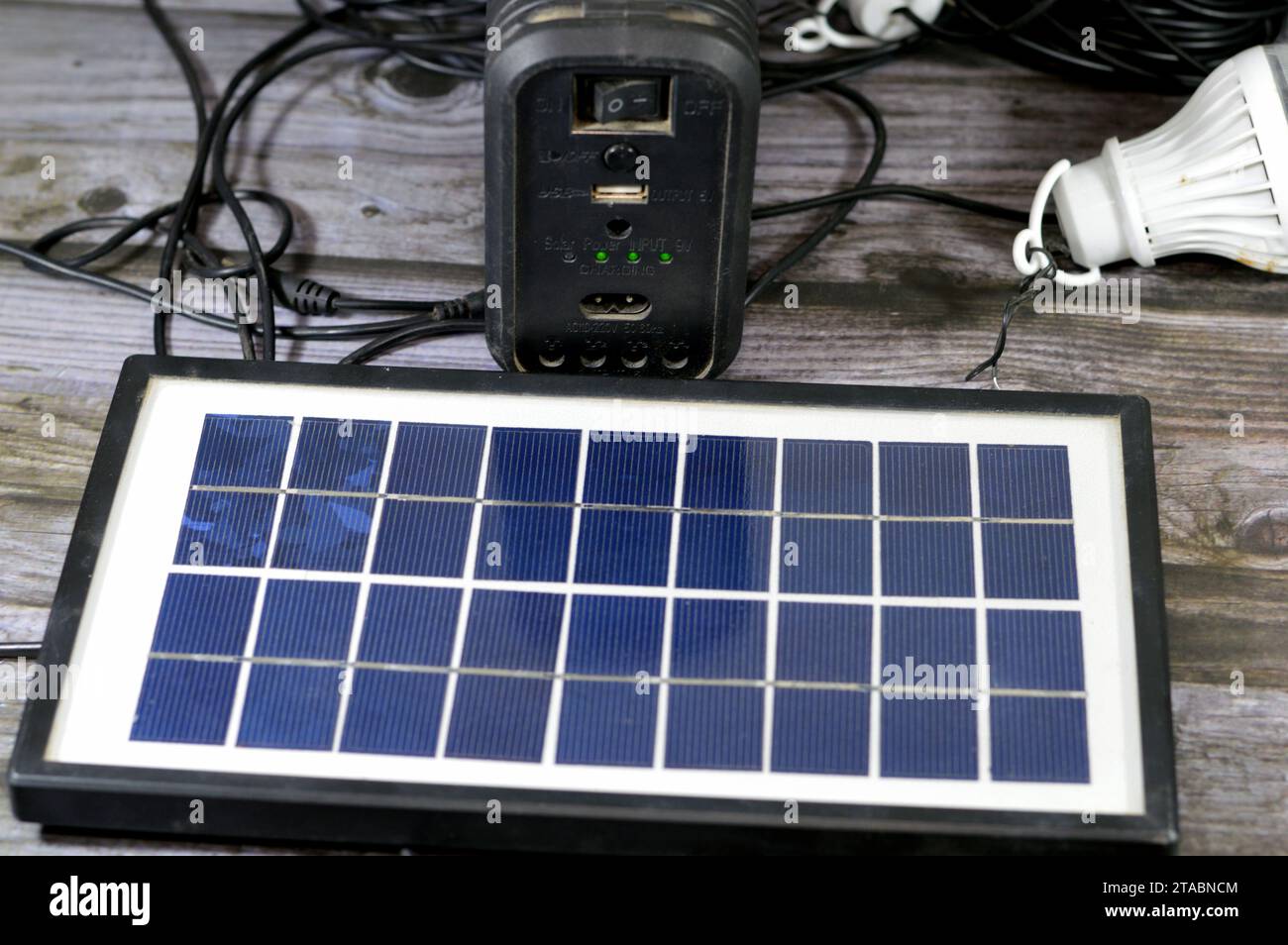 A multi purpose battery charged with a solar panel, a device that ...