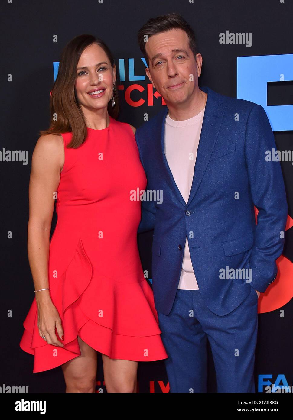 Jennifer Garner, left, and Ed Helms arrive at the premiere of "Family Switch," Wednesday, Nov ...