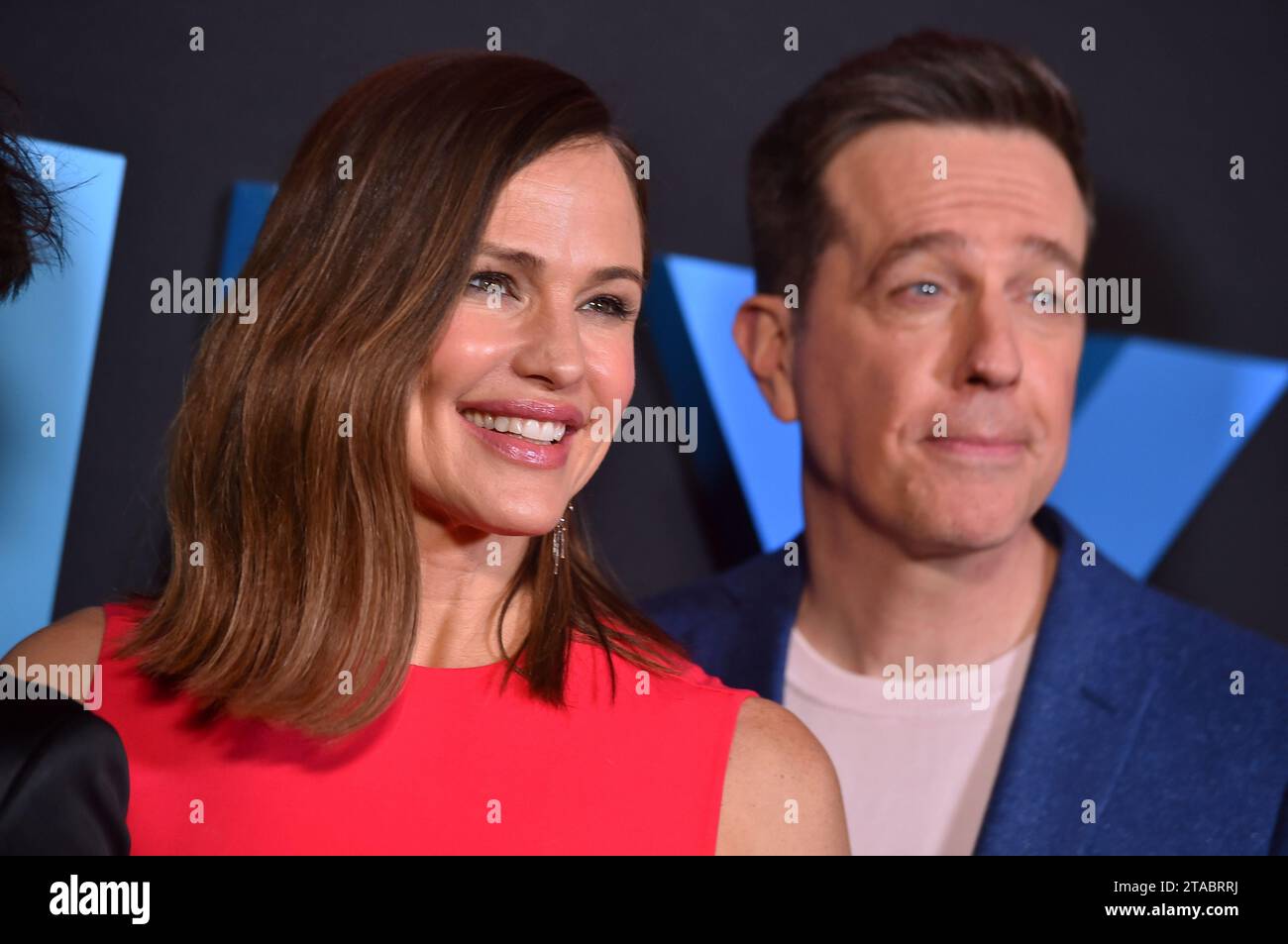 Jennifer Garner, left, and Ed Helms arrive at the premiere of "Family Switch," Wednesday, Nov ...