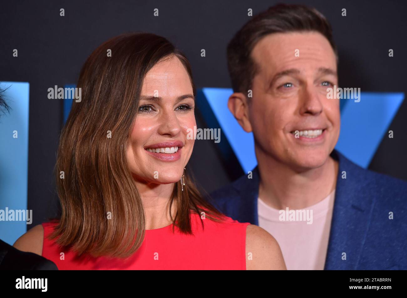 Jennifer Garner, left, and Ed Helms arrive at the premiere of "Family Switch," Wednesday, Nov ...