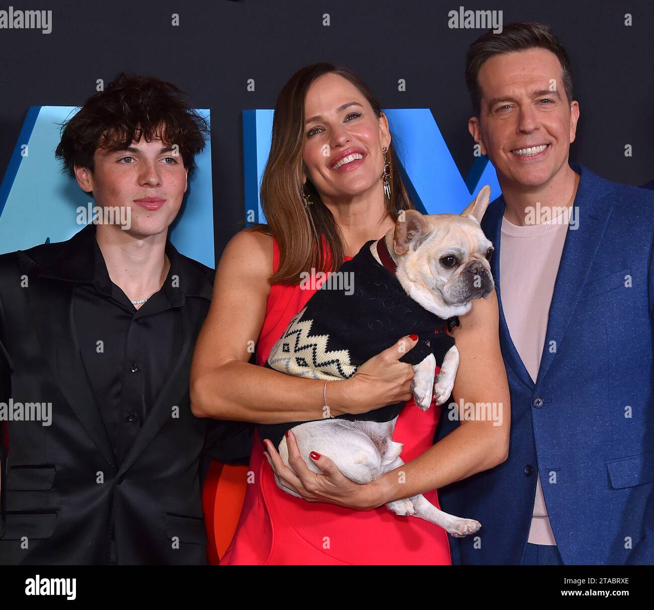 Brady Noon, from left, Jennifer Garner and Ed Helms arrive at the ...