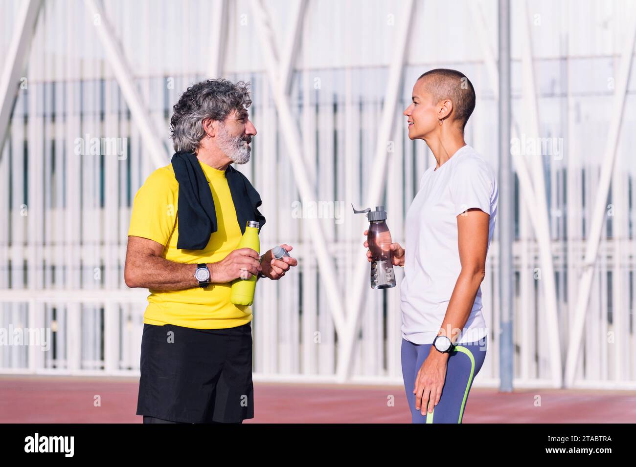 Runner talking to coach hi-res stock photography and images - Alamy