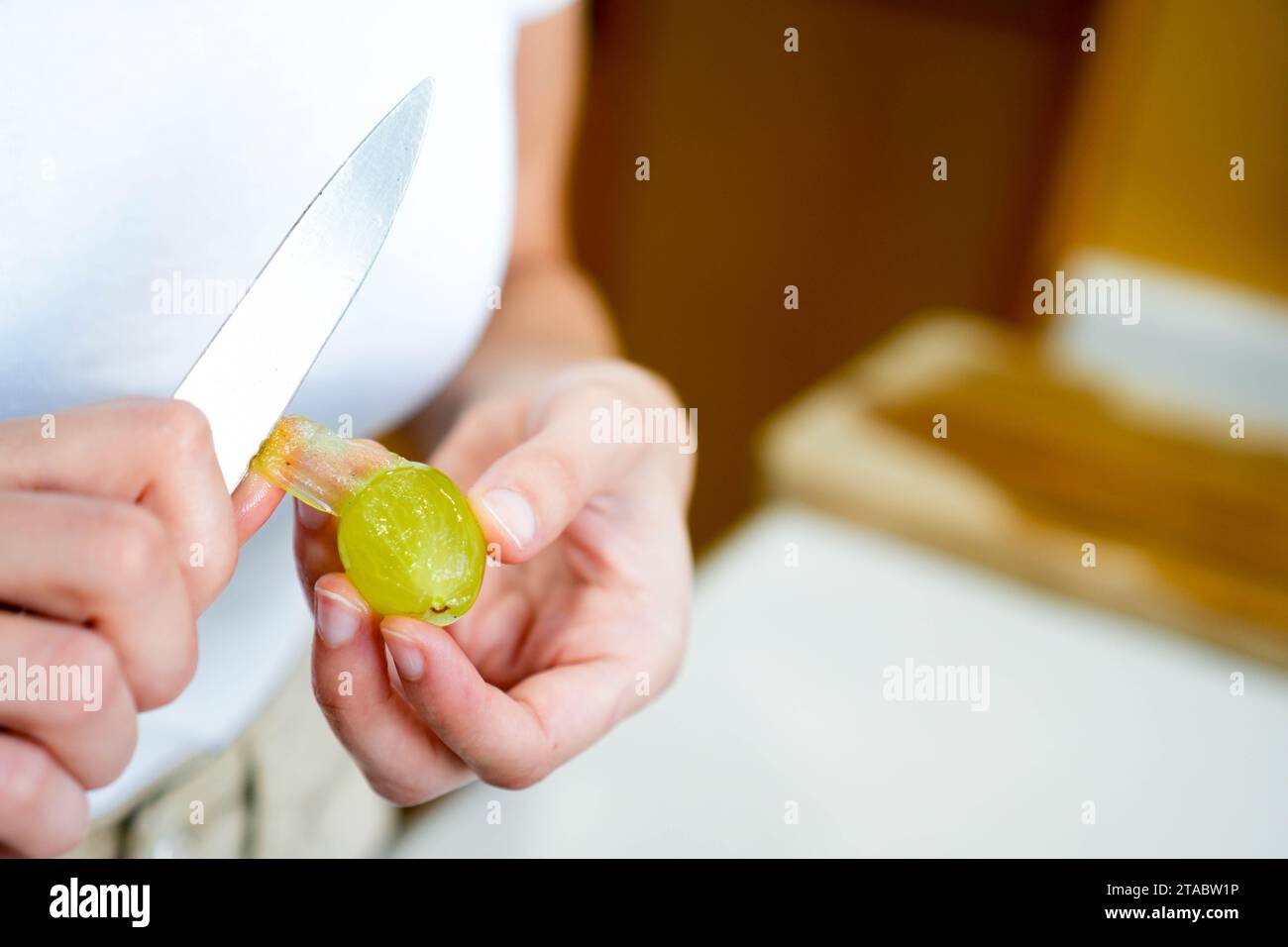 Peeling off with knife hi-res stock photography and images - Alamy