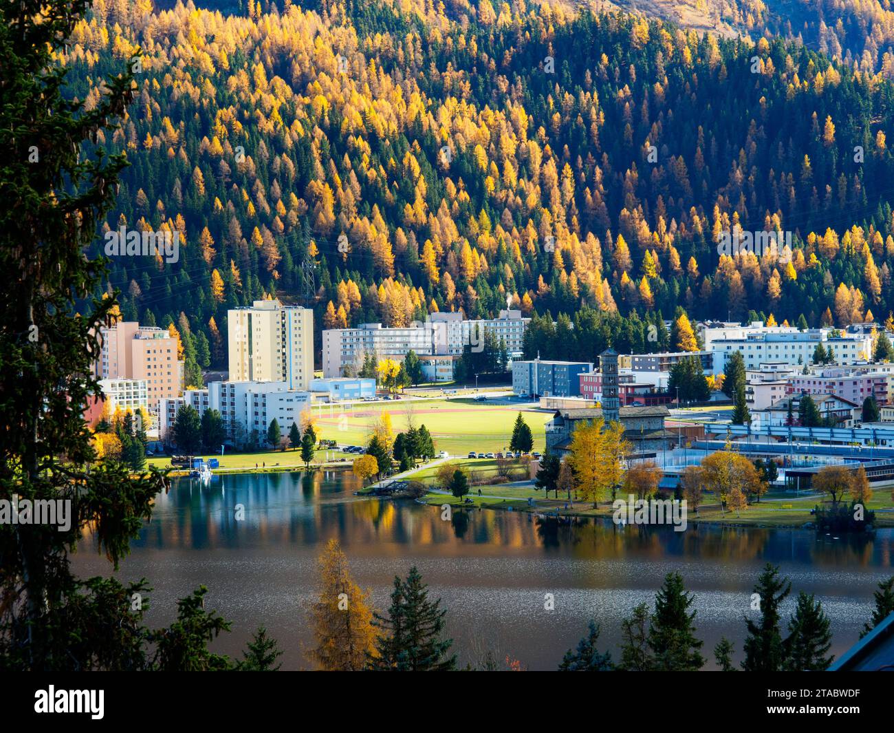Colorful accommodation buildings at St. Moritz lakeshore, Switzerland ...