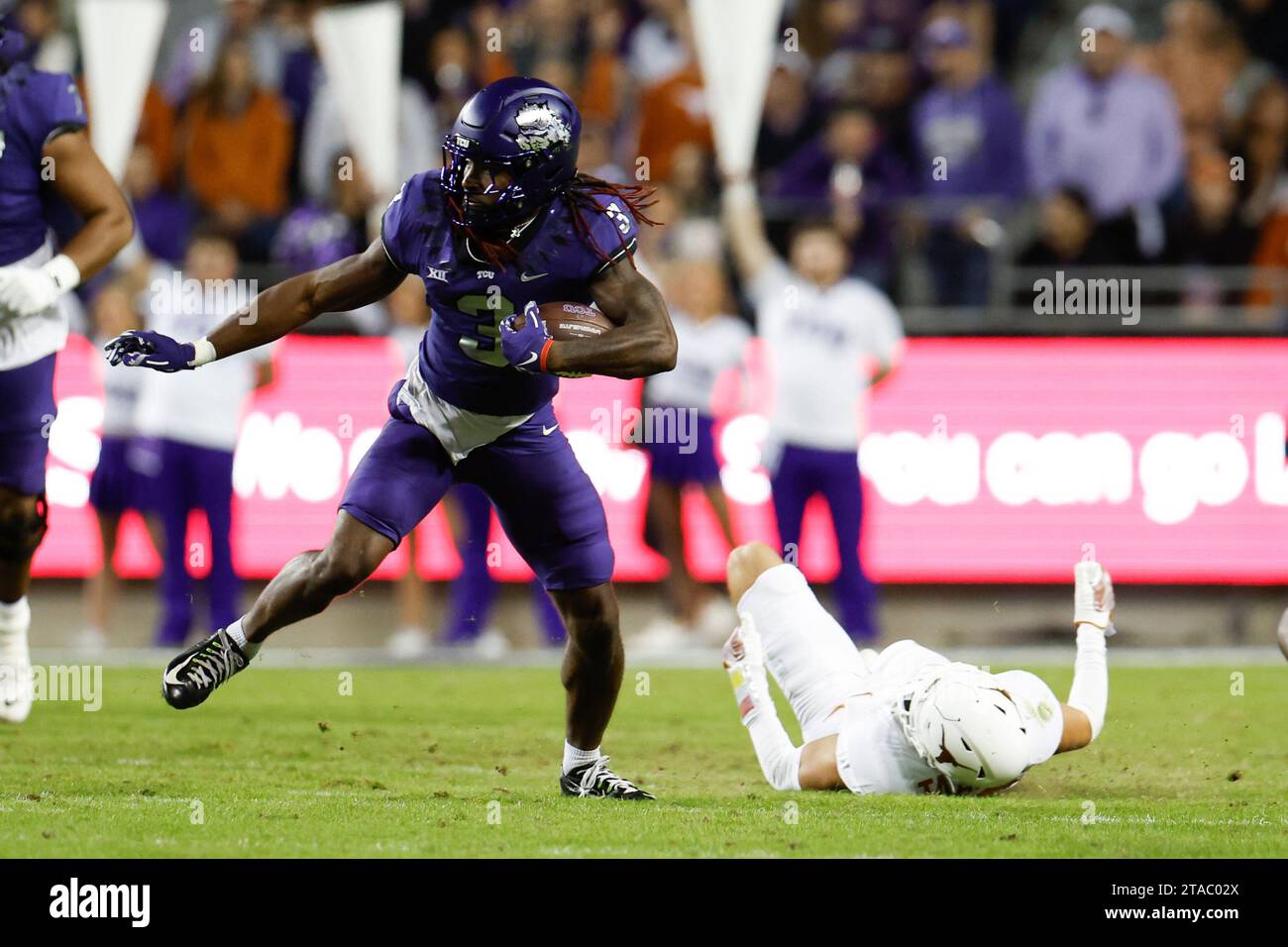 TCU wide receiver Savion Williams (3) carries the ball after a ...