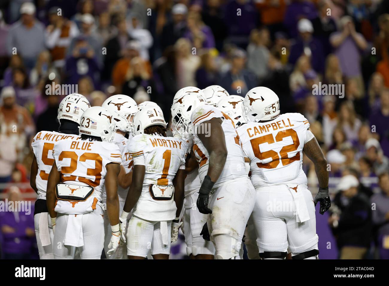 Texas offensive huddle during a play cake including player running back ...