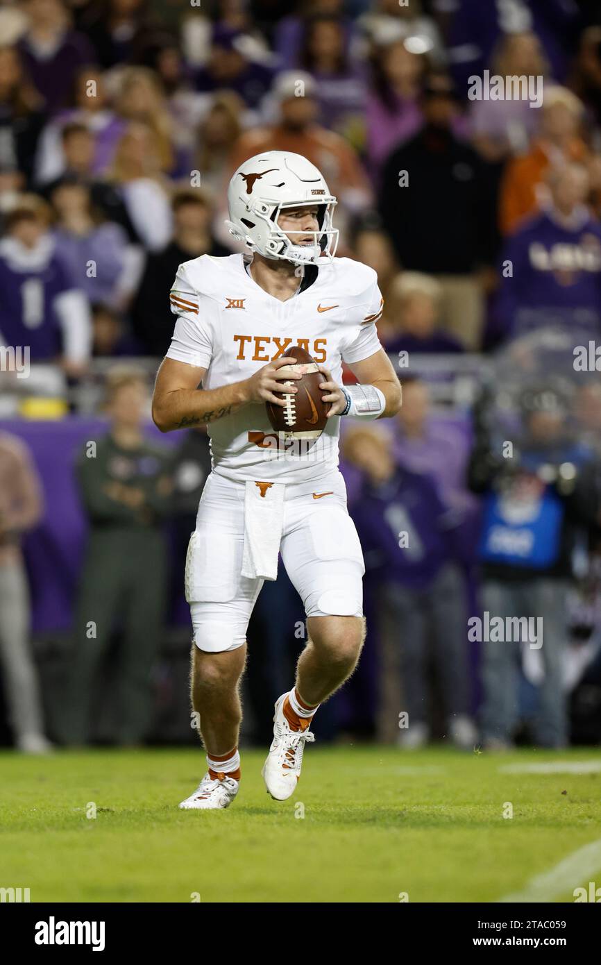 Texas quarterback Quinn Ewers (8) looks to pass during an NCAA college ...