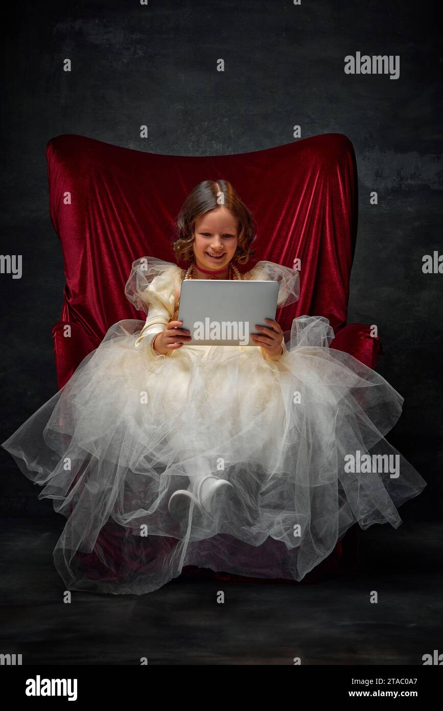 Digitalization. Charming princess, girl sitting on royal throne ...