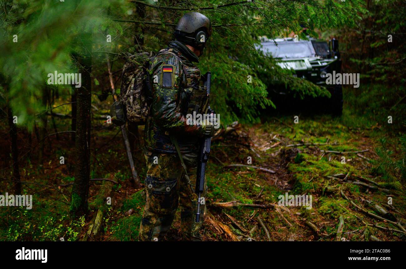 Breitenhees, Germany. 20th Nov, 2023. A Bundeswehr soldier stands next ...