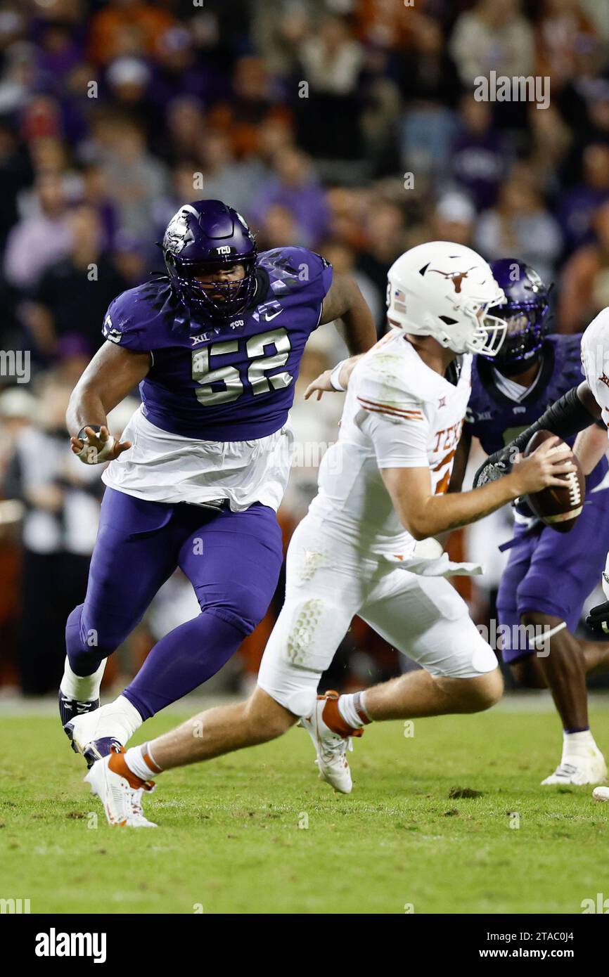 TCU defensive lineman Damonic Williams (52) rushes toward the ...