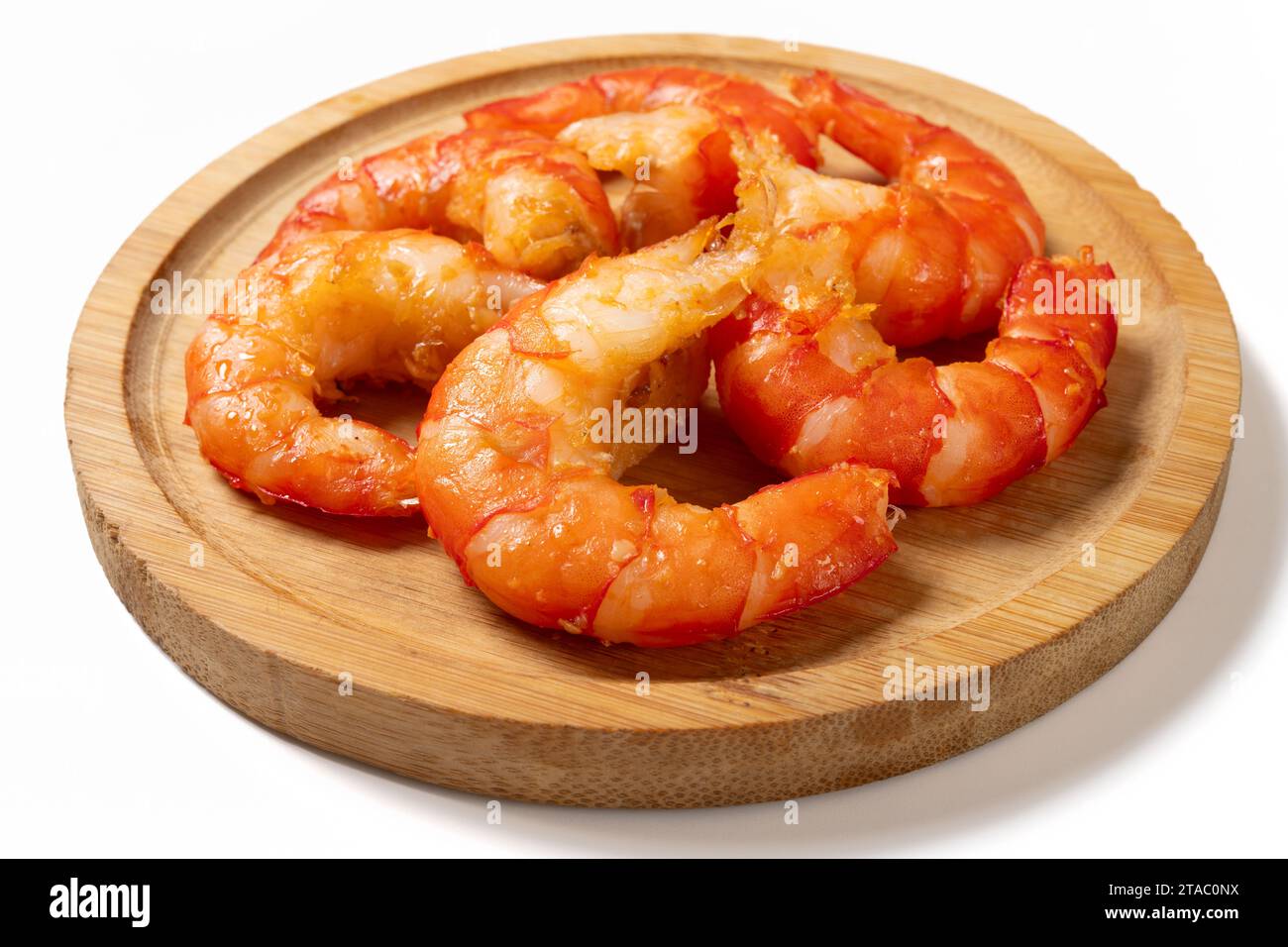 angle view several peeled prawns on a white background Stock Photo - Alamy