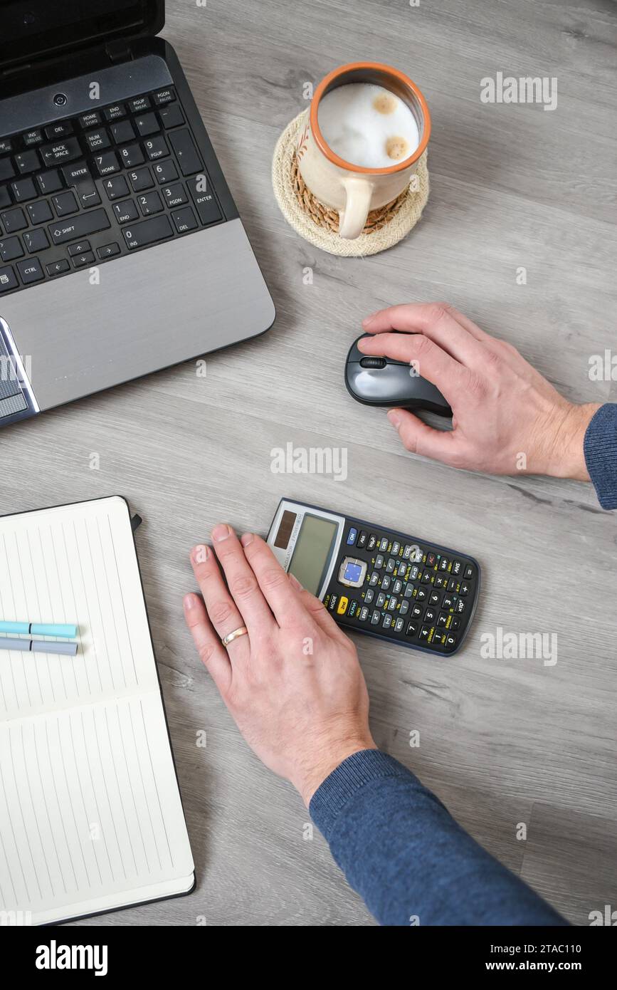 Working in the office, counting money Stock Photo - Alamy