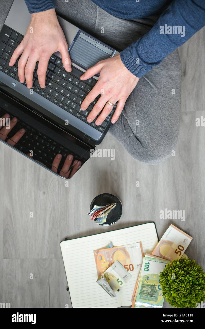 Working in the office, counting money Stock Photo - Alamy