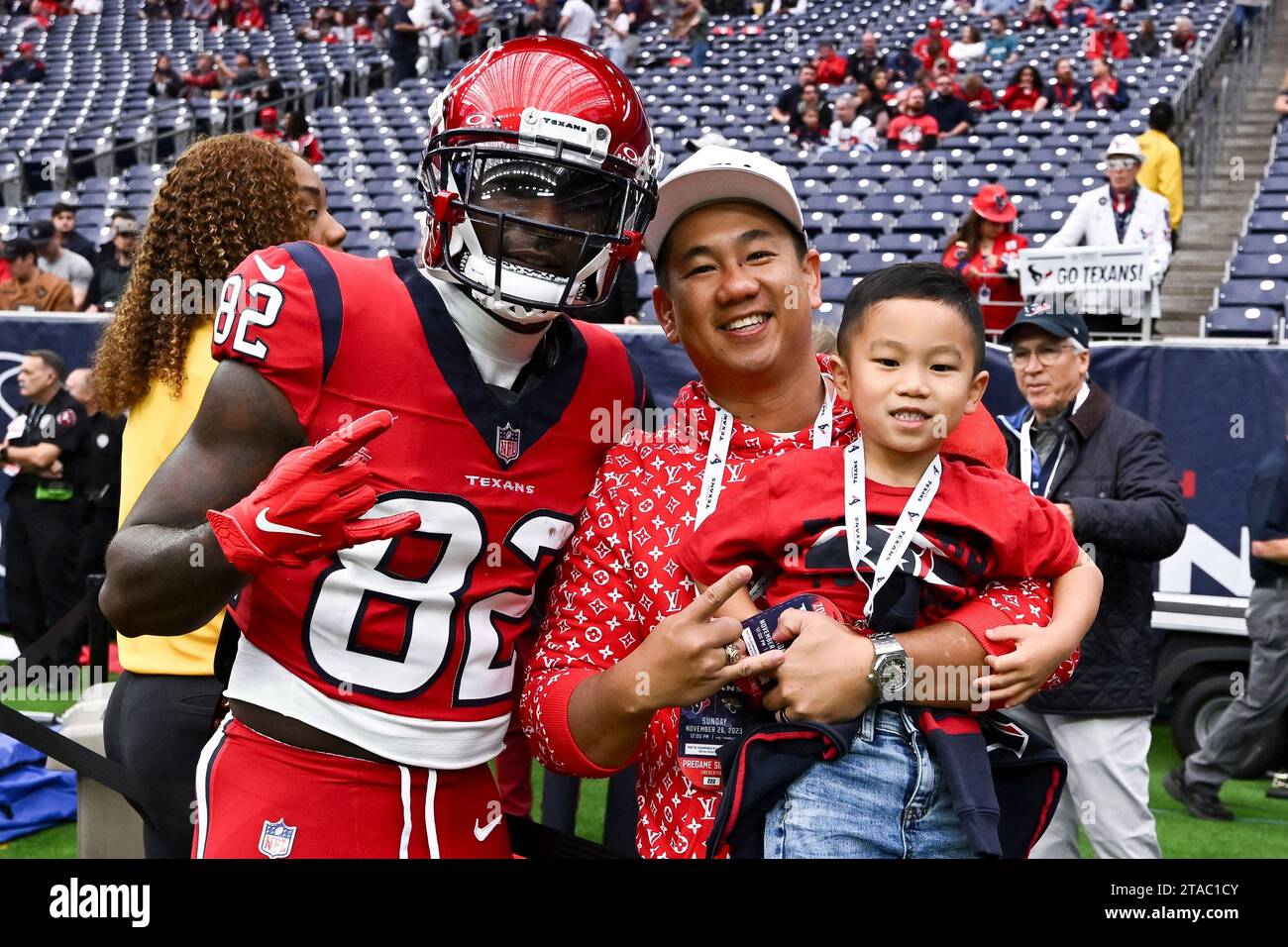 Houston Texans wide receiver Steven Sims (82) poses with fans prior to ...